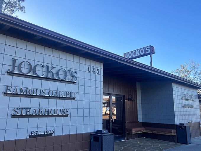 The iconic Jocko's sign promises oak-pit barbecued perfection. This place doesn't need fancy frills when the steaks speak for themselves.