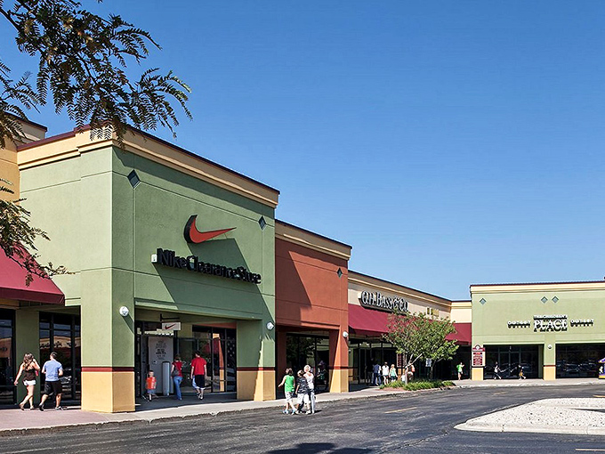 Nike, Coach, and more await behind these colorful storefronts. The hunt for bargains begins with that first step!