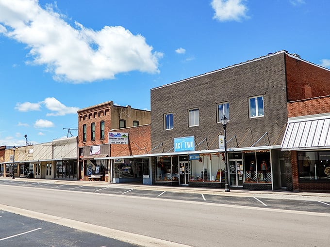 Classic brick buildings stand like patient guardians, watching over a town that refuses to rush.