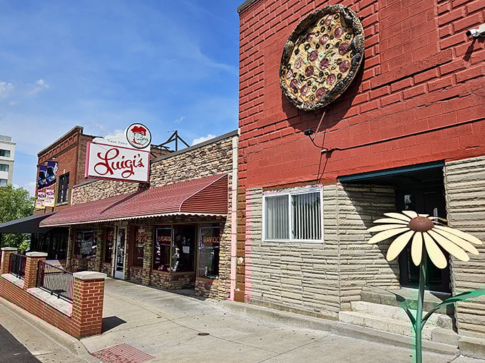 That brick exterior hides a temple of cheese and sauce where Akron residents have been worshipping since before your parents' first date.