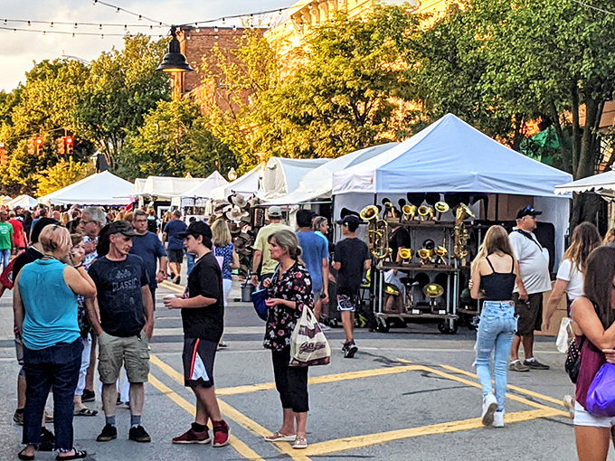 White tents stretch like a treasure hunter's dream, promising vintage finds around every corner.