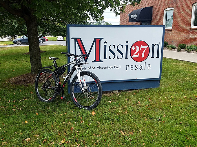 That classic sign beckons thrift hunters inside where donated goods become someone else's perfect find.