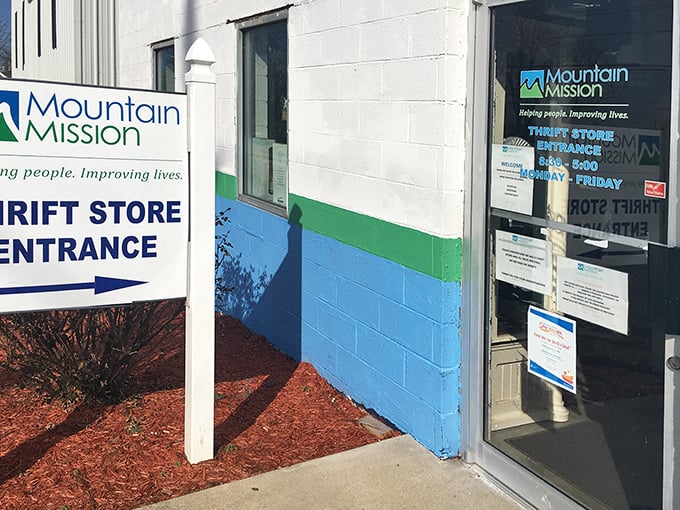 The clear "Thrift Store Entrance" sign points the way to adventure. Like a treasure map where X marks the spot for incredible finds!