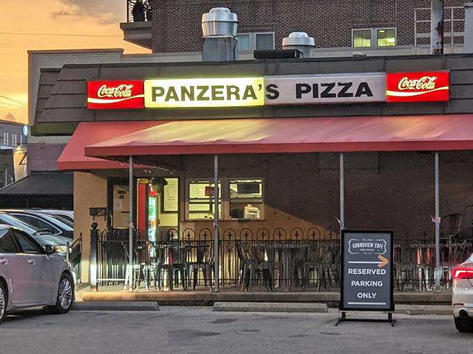 When evening light hits just right, even the simplest pizzeria becomes a beacon of comfort food magic.