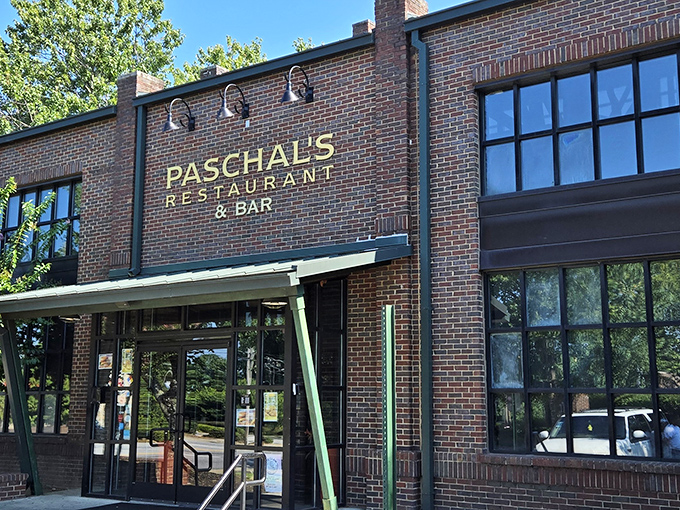 The brick facade of Paschal's Restaurant & Bar stands proudly in Atlanta, a historic beacon of Southern comfort and legendary fried chicken.