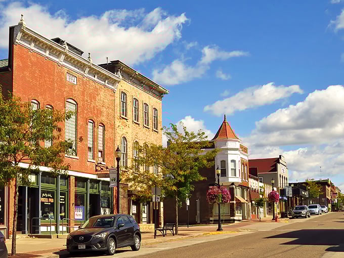 Classic brick storefronts line the street like old friends sharing budget-friendly secrets together.