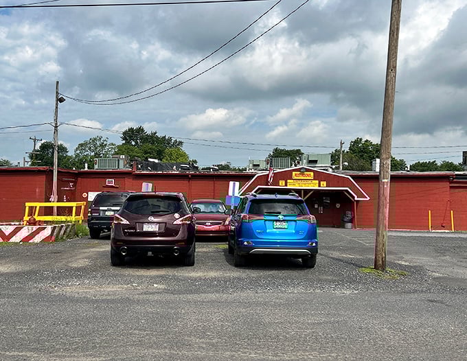 Behind this unassuming red entrance lies a labyrinth of wonders. It's like a treasure cave with better lighting and snack options.