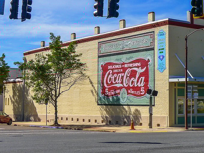 That vintage Coca-Cola sign whispers stories of simpler times when soda fountains were social media.