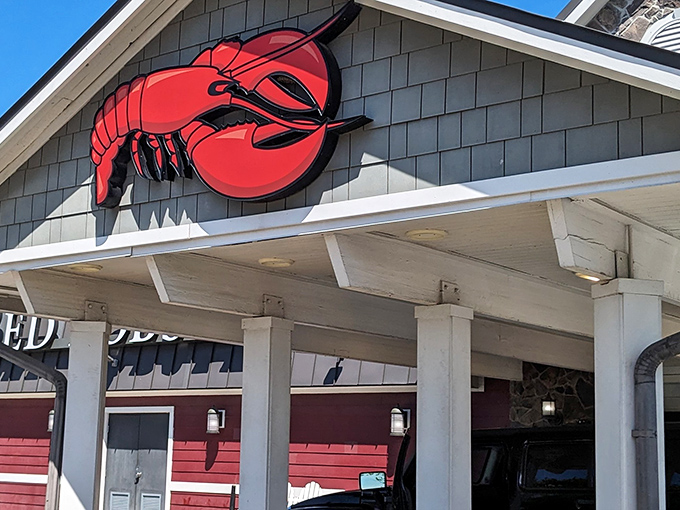 Sometimes the best seafood experiences hide behind the most familiar facades and cheerful crustacean mascots.