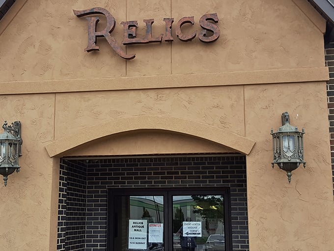 The Relics sign beckons with old-world charm, where every doorway leads to decades of forgotten memories waiting for rediscovery.