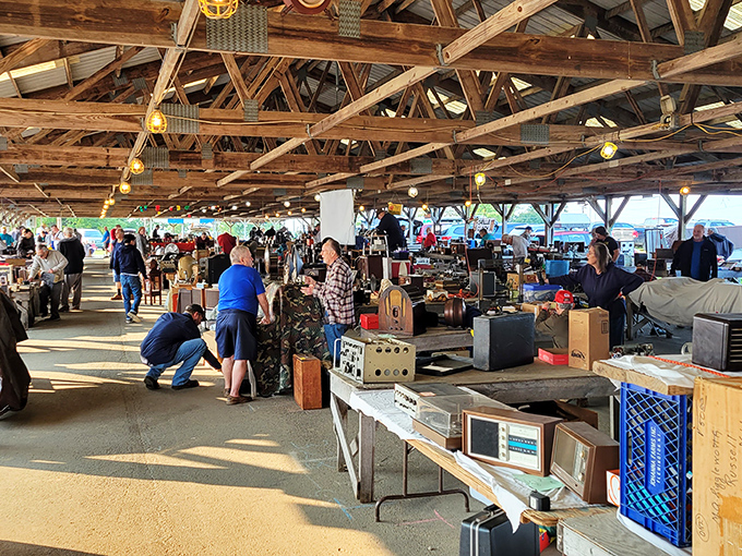 Under the pavilion's shelter, vintage radios and electronics create a nostalgic collector's paradise.