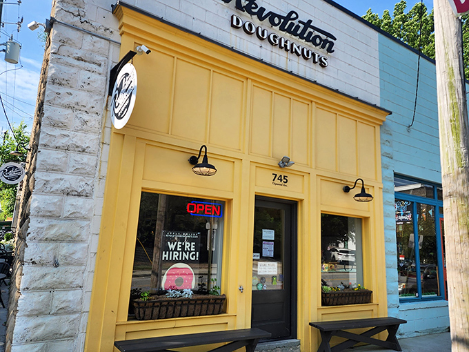 That bright "OPEN" sign is the culinary equivalent of finding treasure. Revolution's charming exterior promises handcrafted delights within.