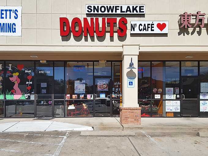 The cheerful sign of Snowflake Donuts promises sweet morning salvation for early risers and donut enthusiasts alike.
