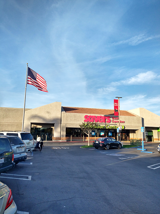The American flag waves proudly over this thrift paradise where deals and patriotism go hand in hand.