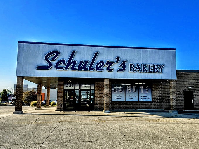 When a bakery's sign is this welcoming, you know the donuts inside are worth every single calorie.