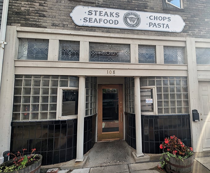 Classic brick and glass windows promise serious steakhouse business inside this Louisville gem.