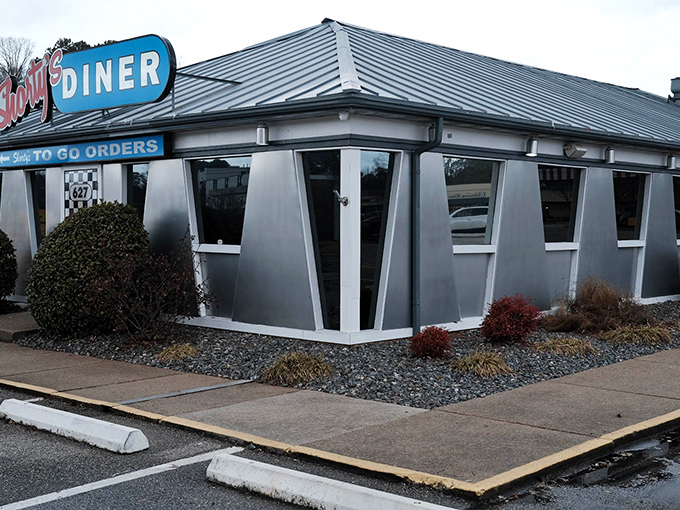 That iconic silver-and-blue exterior isn't just for show&mdash;it's a promise of diner magic waiting inside.