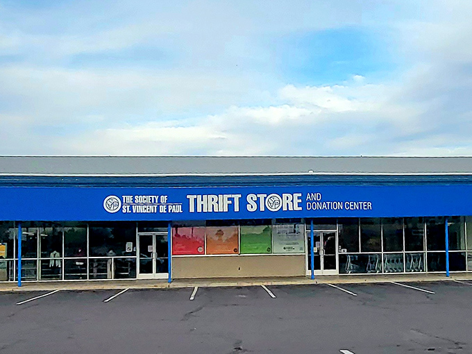 This blue-signed thrift paradise stretches wide, inviting bargain hunters to discover their next favorite find inside.