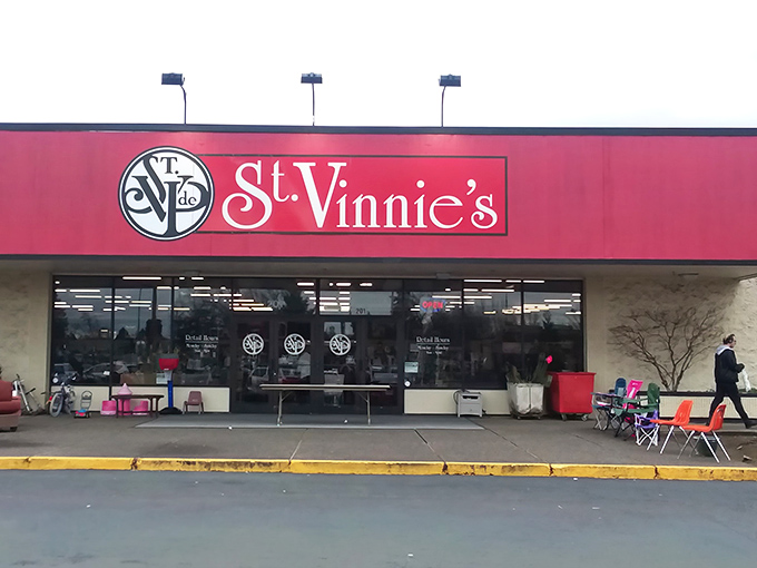 The bright red sign of St. Vinnie's stands out like a beacon for thrift lovers. Where one person's castoffs become another's treasured finds.