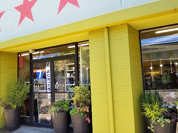 Step inside where vintage clothing dangles like colorful memories waiting to be rediscovered.