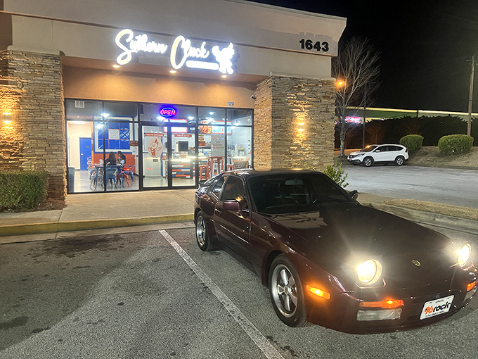 Evening glow illuminates this chicken sanctuary, promising crispy delights that'll make your taste buds sing.