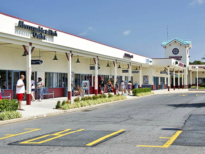 Classic outlet architecture meets modern shopping convenience in this shopper's paradise by the beach.