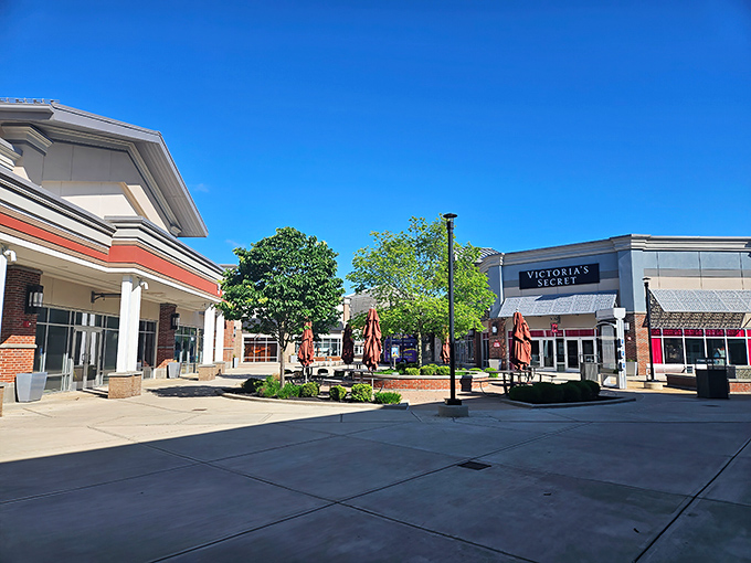Open-air retail therapy at its finest, complete with benches for weary wallet recovery.