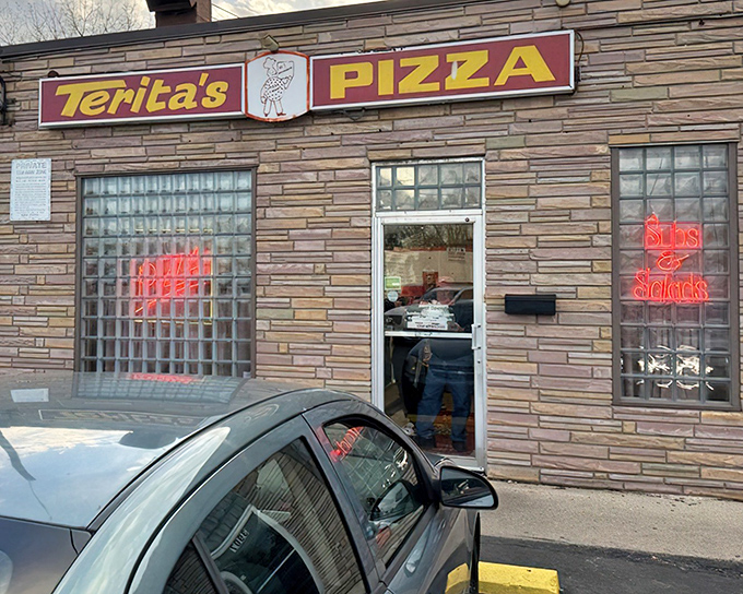 That weathered brick exterior holds secrets that would make your grandmother's kitchen jealous.