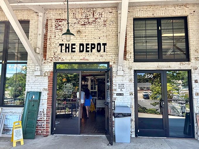 Step through these weathered doors where exposed brick meets modern glass, creating the perfect backdrop for treasure hunting adventures.