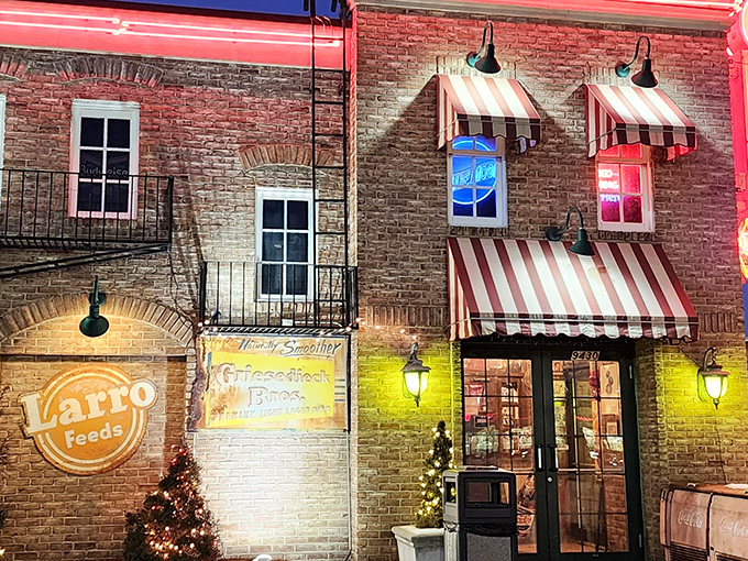 Night falls and The Pit Rib House transforms into a BBQ beacon with those classic striped awnings. Like a time machine with sauce on the side.