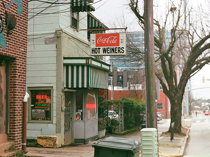 Winter or summer, The Roast Grill's iconic striped awning and vintage "Hot Weiners" sign promises simple perfection. Some traditions don't need updating.