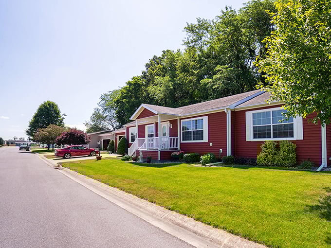 Red siding and green lawns create that perfect "Leave it to Beaver" vibe your grandkids only see in movies.
