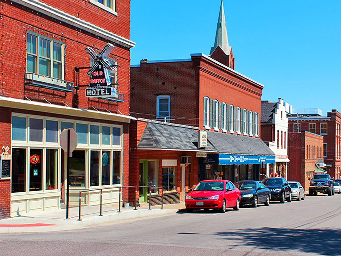 Those colorful awnings and brick facades whisper stories of simpler times when neighbors actually knew each other's names.