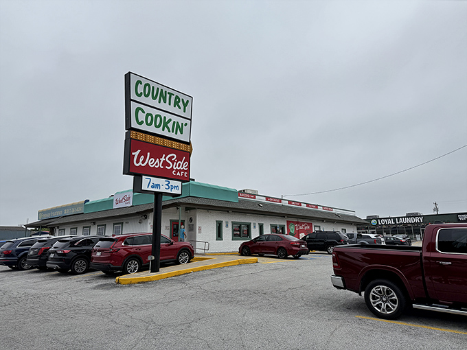 Packed parking lot at West Side Cafe &ndash; where locals know breakfast is worth fighting for a spot.