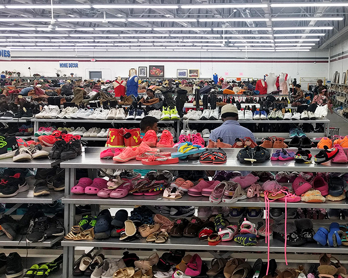 Shoe paradise! More footwear options than a centipede convention, all organized with military precision.