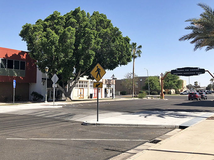 Tree-lined streets whisper stories of the Old West while modern bargains await around every sun-drenched corner.