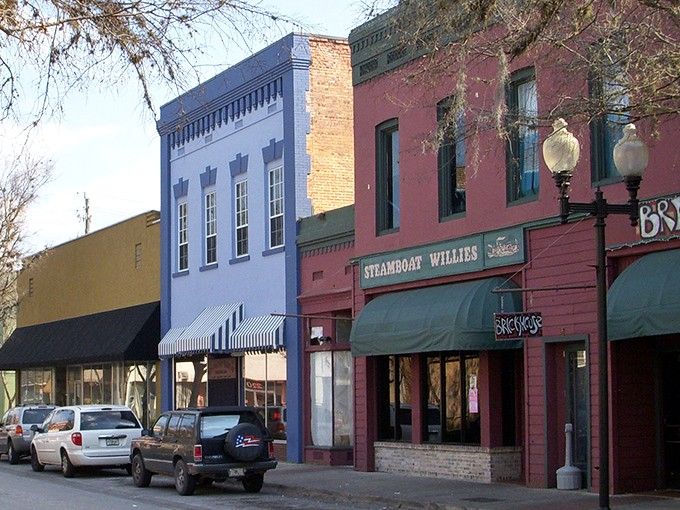 Downtown charm meets rainbow hues - like a box of crayons decided to open shops together.