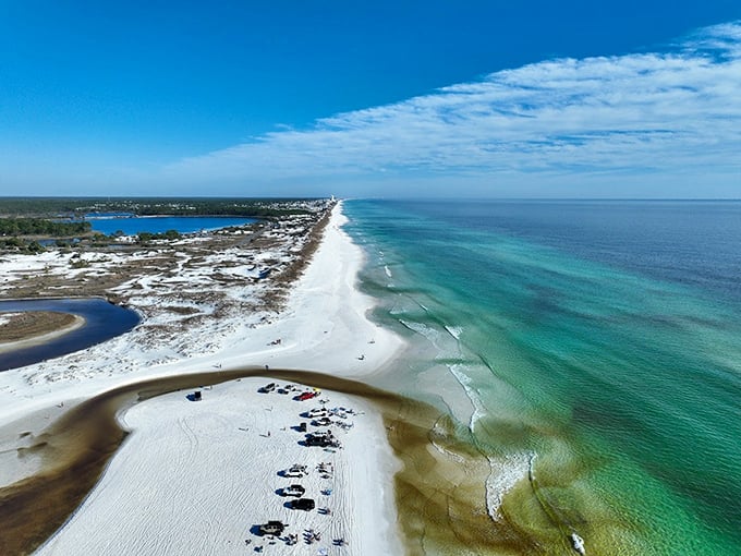 The ultimate beach sandwich: pristine white shoreline pressed between emerald waters and Western Lake. Mother Nature showing off her plating skills. 