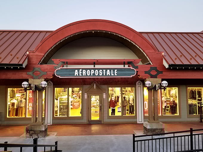 Aeropostale's inviting storefront glows at dusk, beckoning shoppers with the promise of casual fashion finds at prices that won't break the vacation budget.