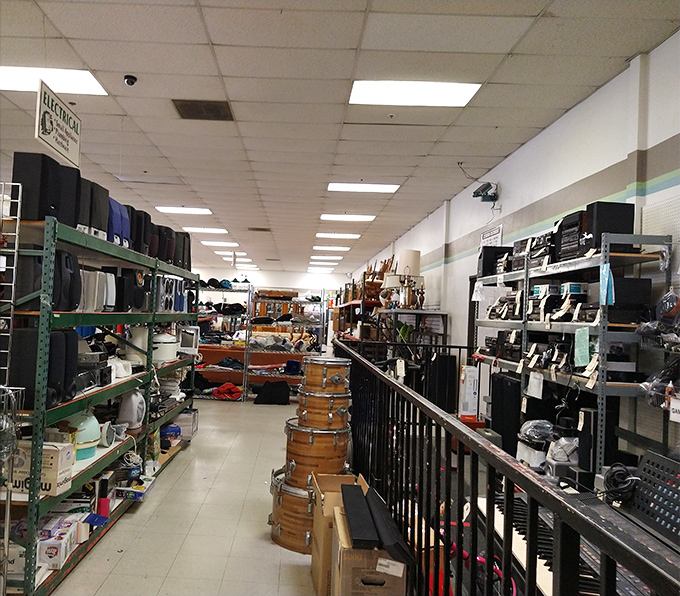 Appliance heaven awaits the budget-conscious homemaker. That stack of drums isn't a garage band's practice space—it's someone's future vintage-inspired decor.