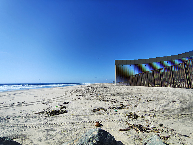 Golden sand stretches into the horizon at Border Field State Park Beach, where peaceful waves meet California&rsquo;s southernmost coastline.
