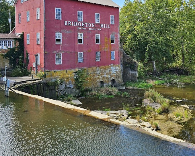 Standing since 1823, the crimson Bridgeton Mill reflects in the water below like a Norman Rockwell painting come to life in three dimensions. 