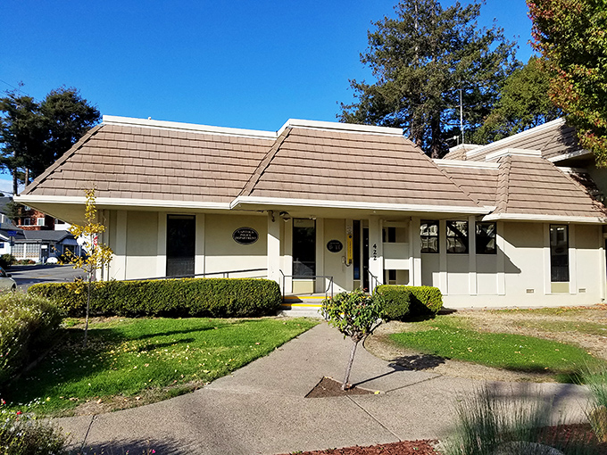This unassuming building houses local history and community services, proving that in Capitola, even the practical comes wrapped in coastal architecture.
