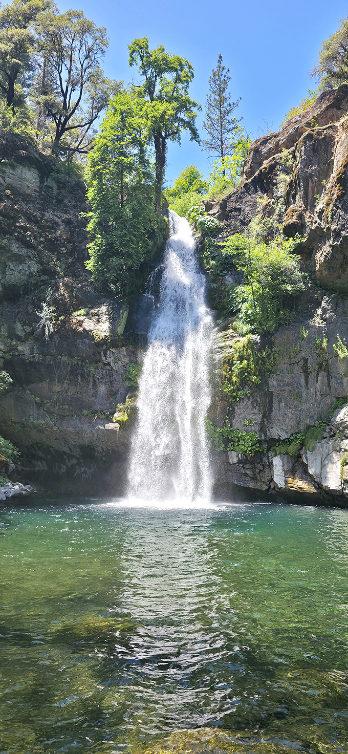 The waterfall's grand finale: crystal-clear waters invite you for what might be the most refreshing swim of your California bucket list.