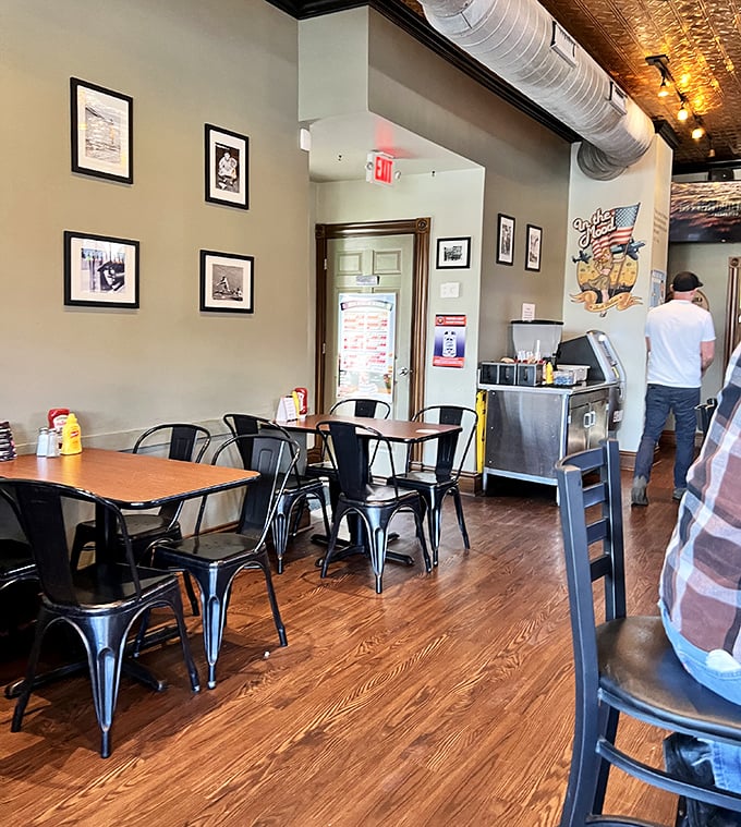 Industrial chic meets burger bliss in this cozy space where exposed brick whispers "stay awhile."