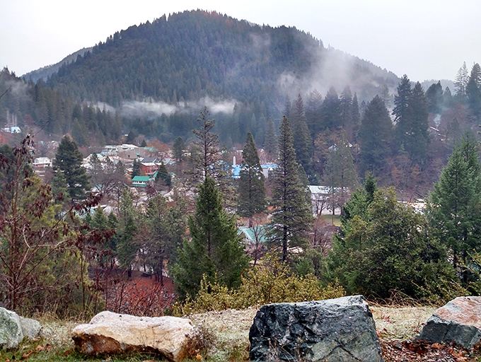 Morning mist embraces Downieville like nature's own special effect, turning this mountain hamlet into something straight out of a dream sequence.