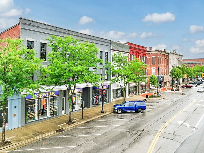 Small-town charm meets practical living along Norwalk's Main Street, where traffic lights are merely suggestions and everyone seems to know your budget.