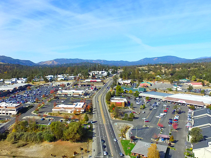 An aerial view that says it all &ndash; Oakhurst nestled in nature's pocket, where civilization meets wilderness without awkward small talk.