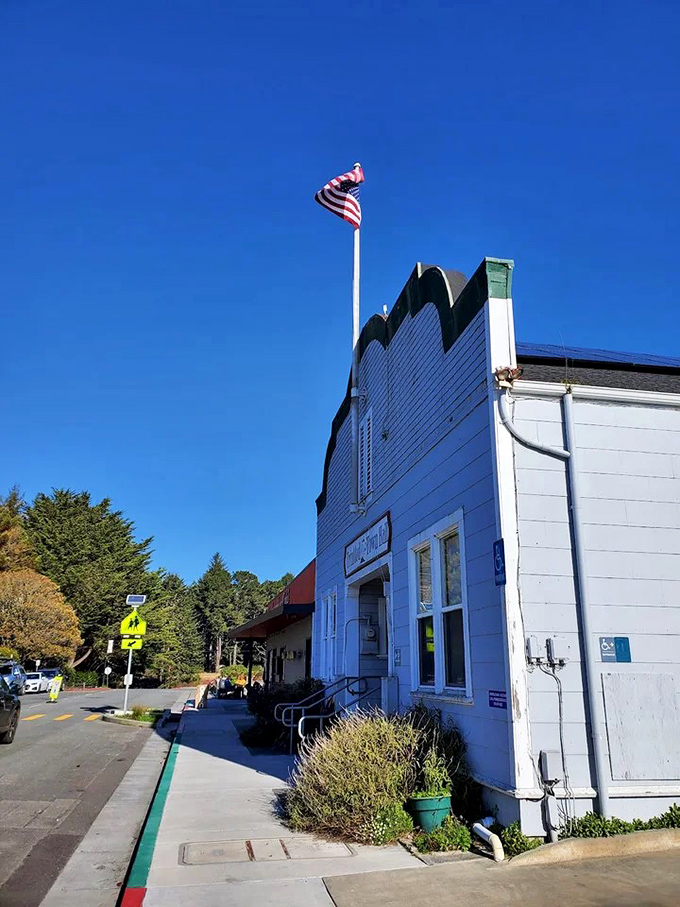 Small-town Americana with a coastal twist. This little blue building isn't trying to impress anyone, which is precisely why it's so charming.
