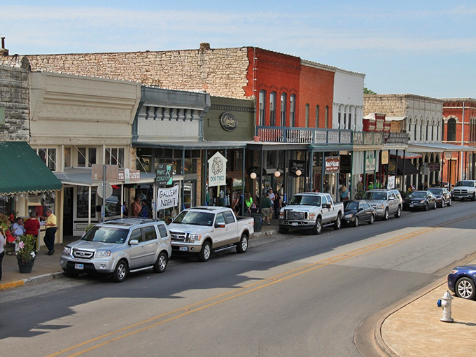 Sunlight plays across the varied architectural styles of downtown Granbury, where each storefront seems to whisper, "Slow down, partner. The hustle can wait."